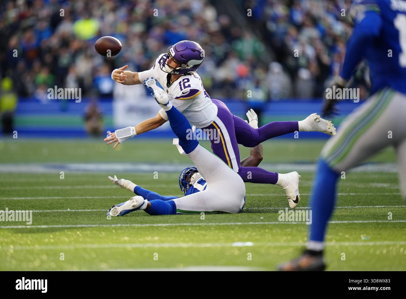 Minnesota Vikings quarterback Max Brosmer (12) lobs the ball in the ...