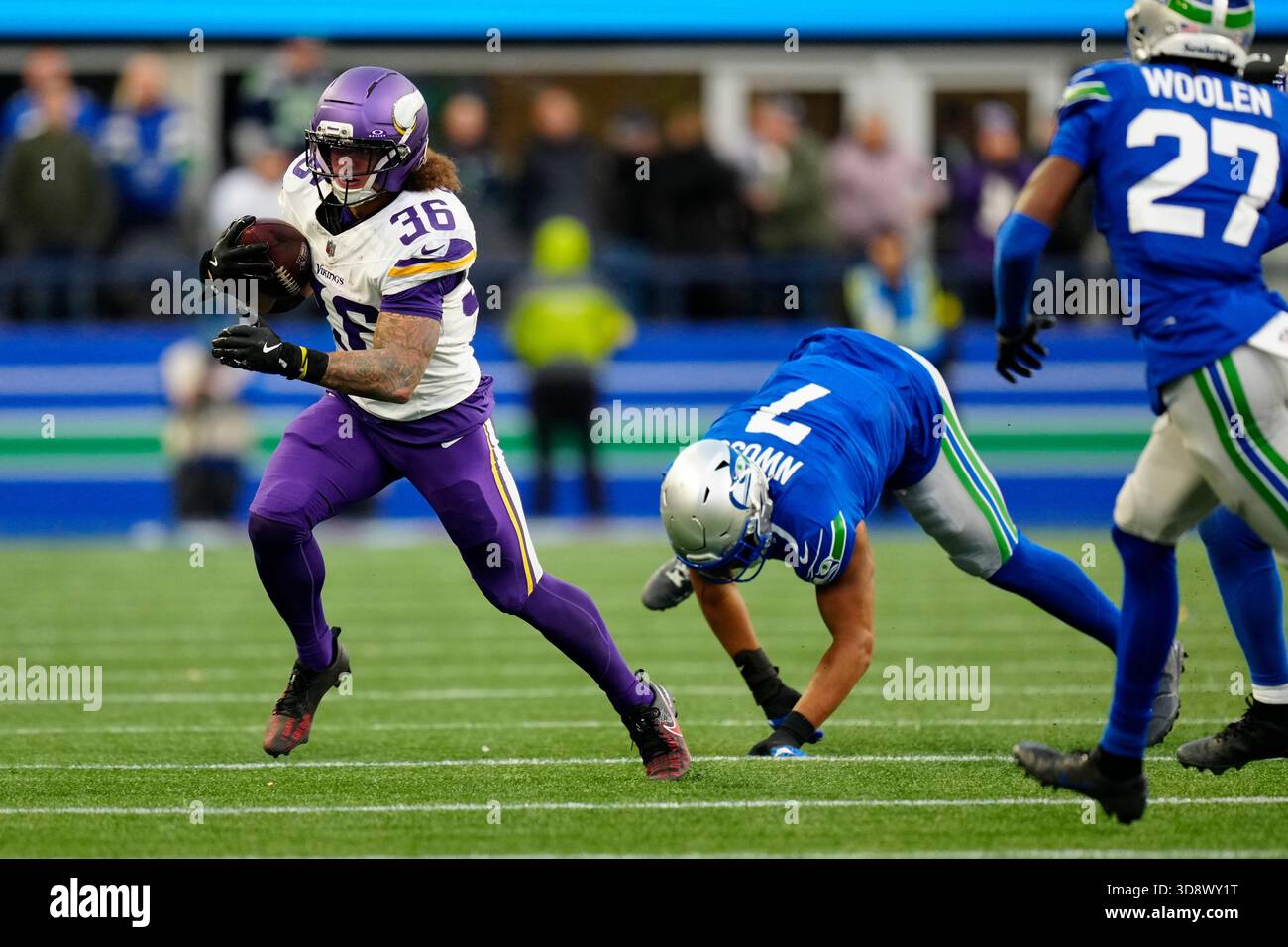Minnesota Vikings running back Zavier Scott (36) runs with the ball during an NFL football game ...