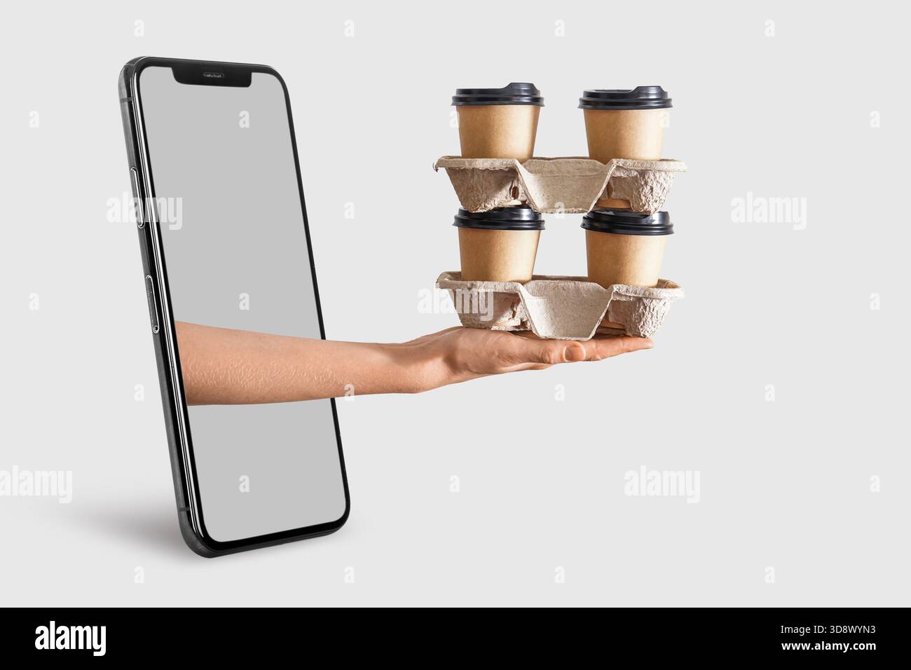 Hand with cups of coffee popping out of smartphone screen on light ...