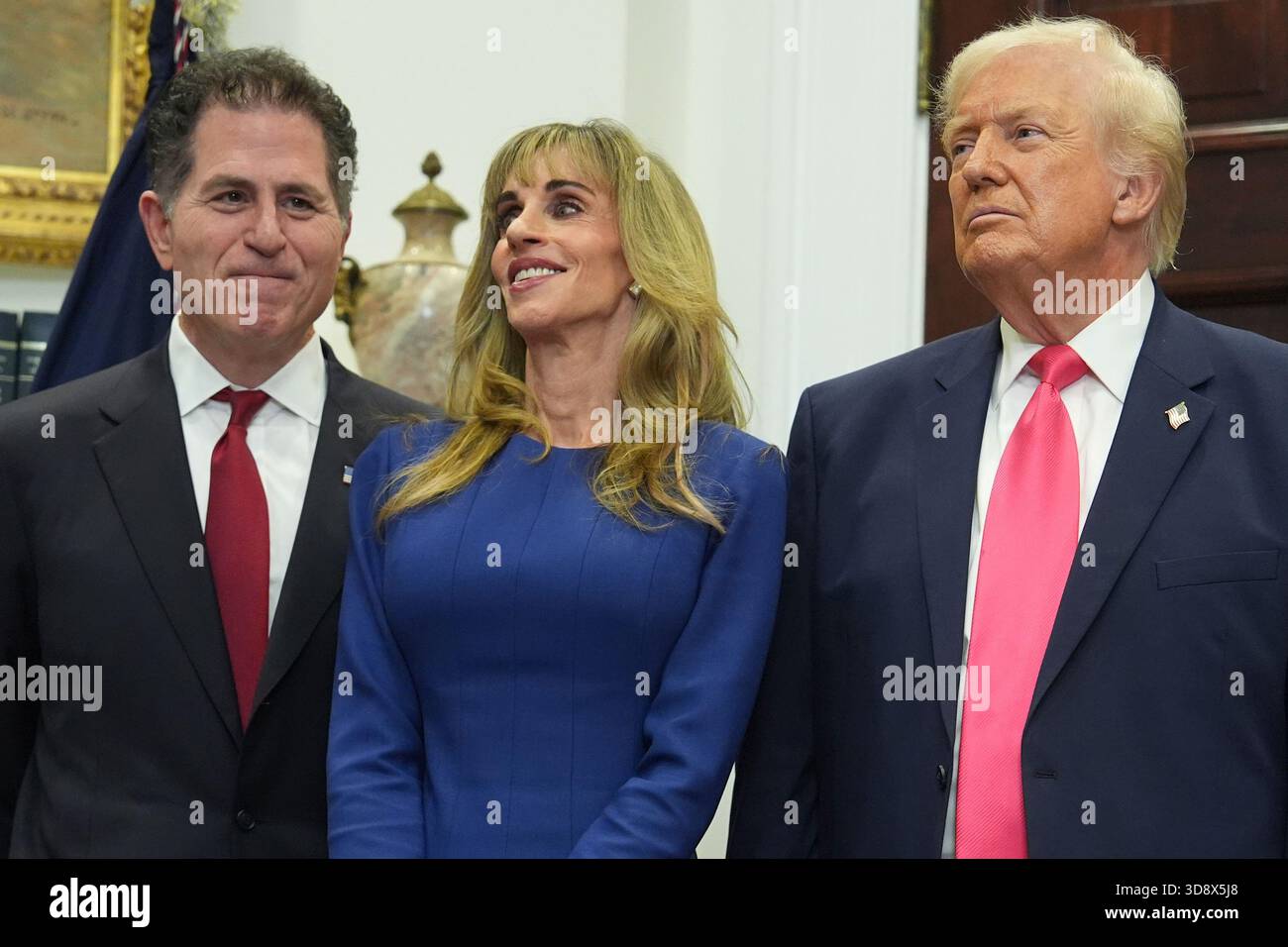 Michael Dell, left, his wife Susan and President Donald Trump listen ...