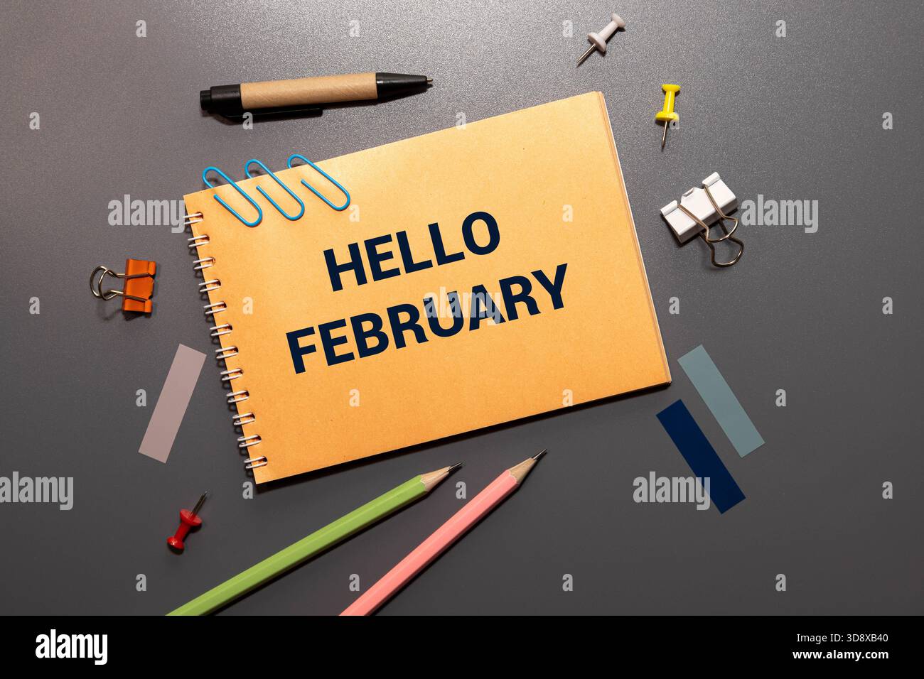 HELLO FEBRUARY words written under ripped and torn paper Stock Photo ...