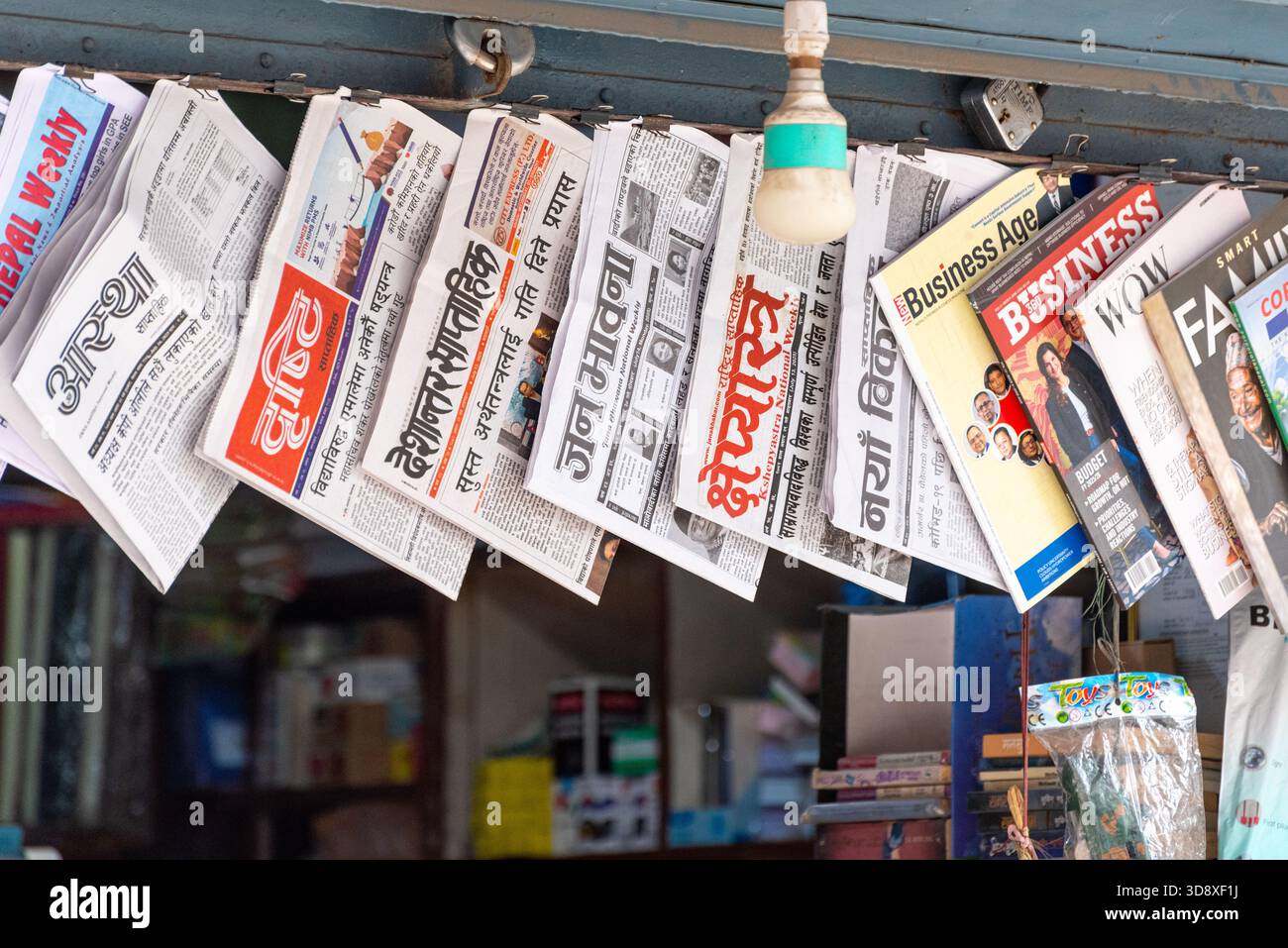 Hanging daily newspapers hi-res stock photography and images - Alamy
