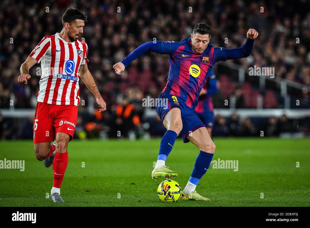 Clement LENGLET of Atletico Madrid and Robert LEWANDOWSKI of Barcelona ...