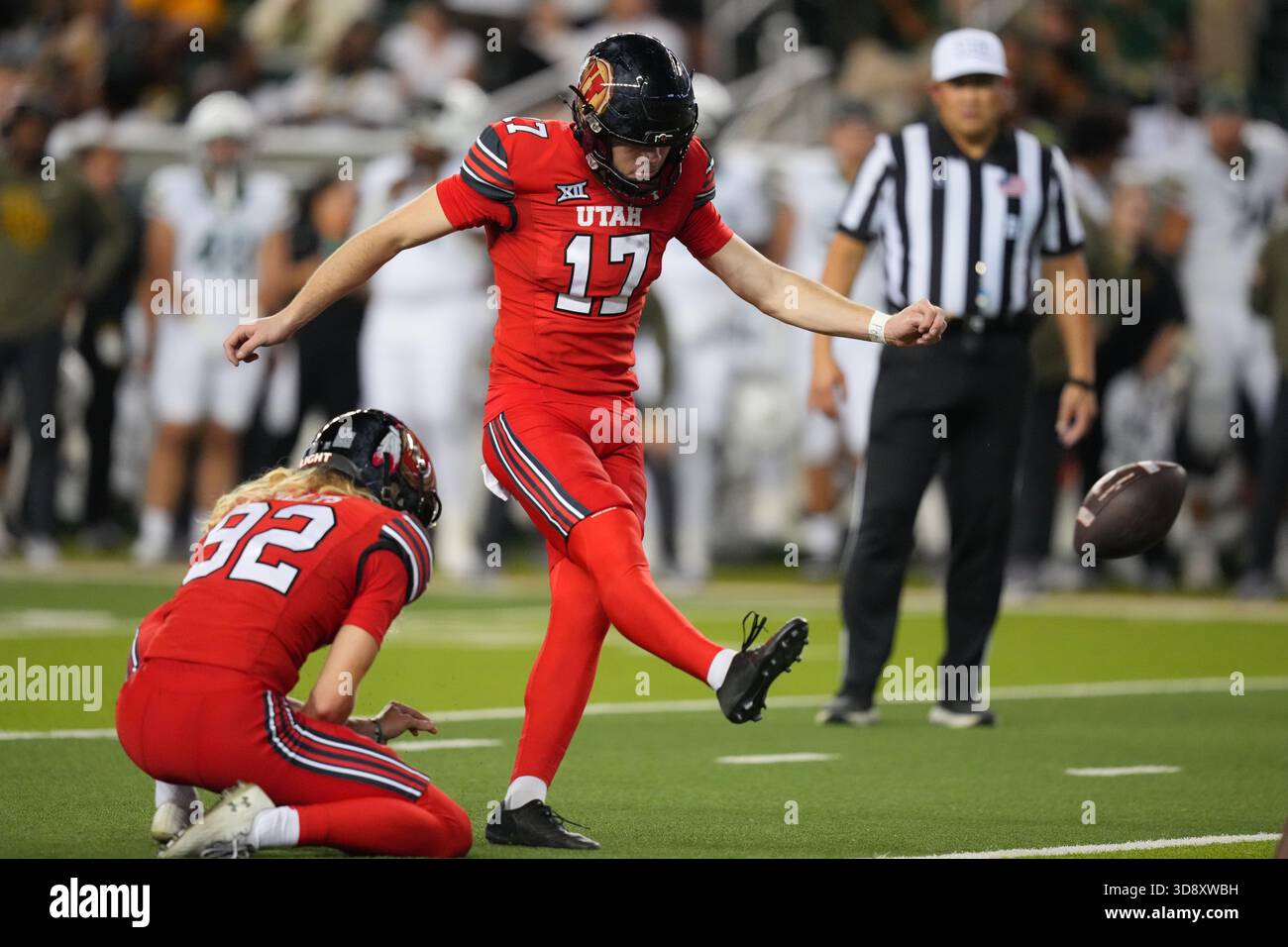 Utah kicker Dillon Curtis boots an extra point during the second half ...