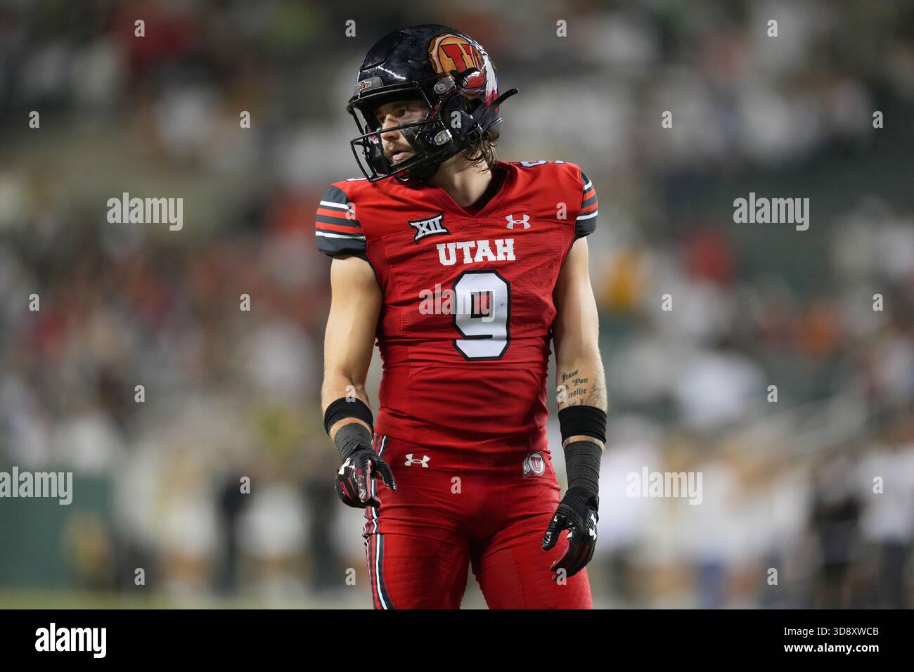 Utah wide receiver Ryan Davis looks on during the second half of an ...