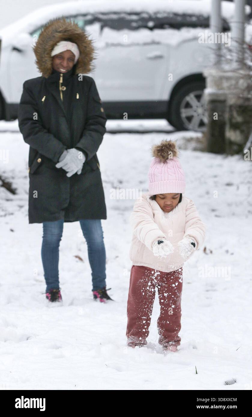 Britney Thompson watches her daughter, Dior Thompson, 3, play in the ...