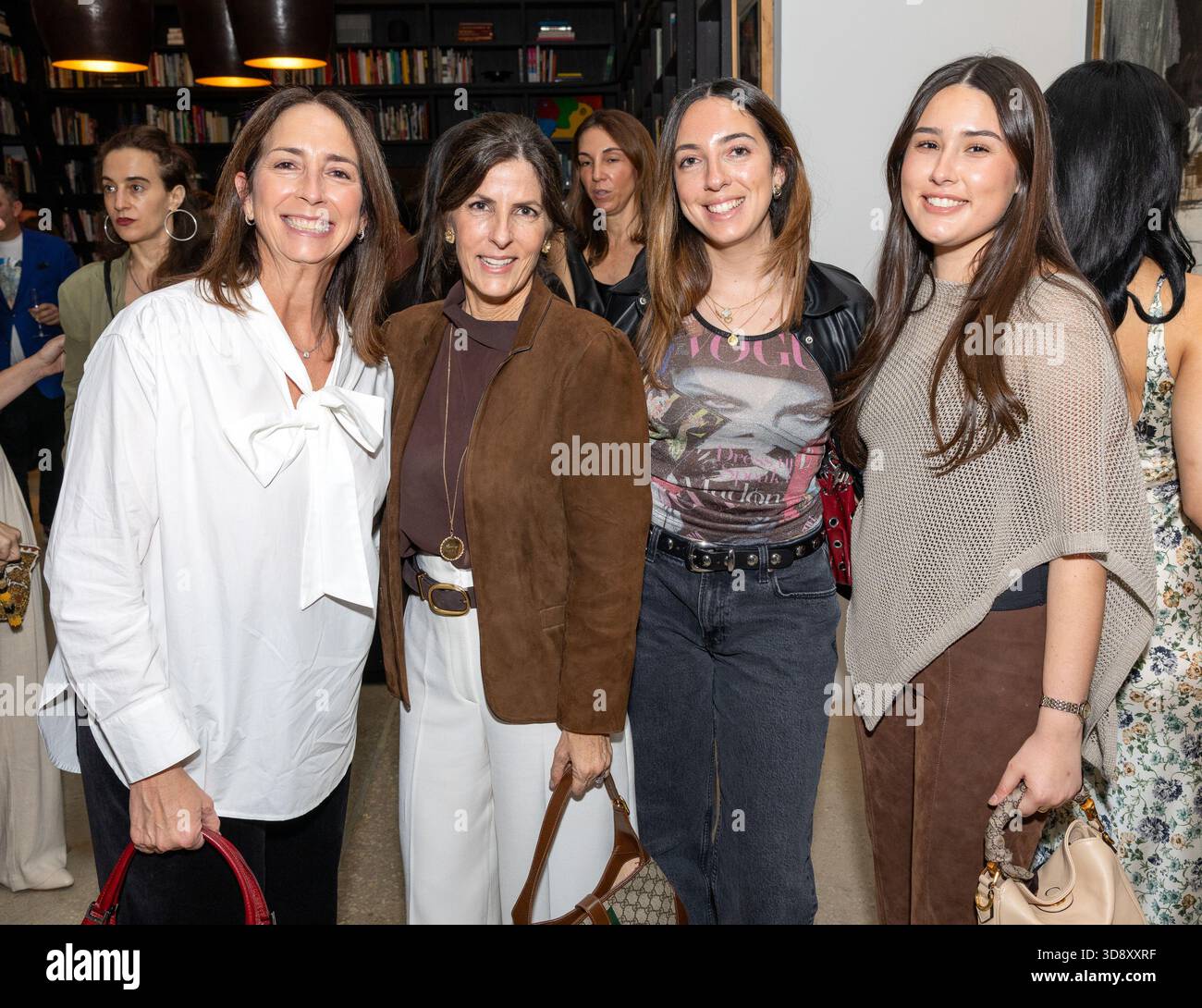 MIAMI, FL - DEC 1: Carolina Levine, Beatriz Garces, Victoria Levine and ...