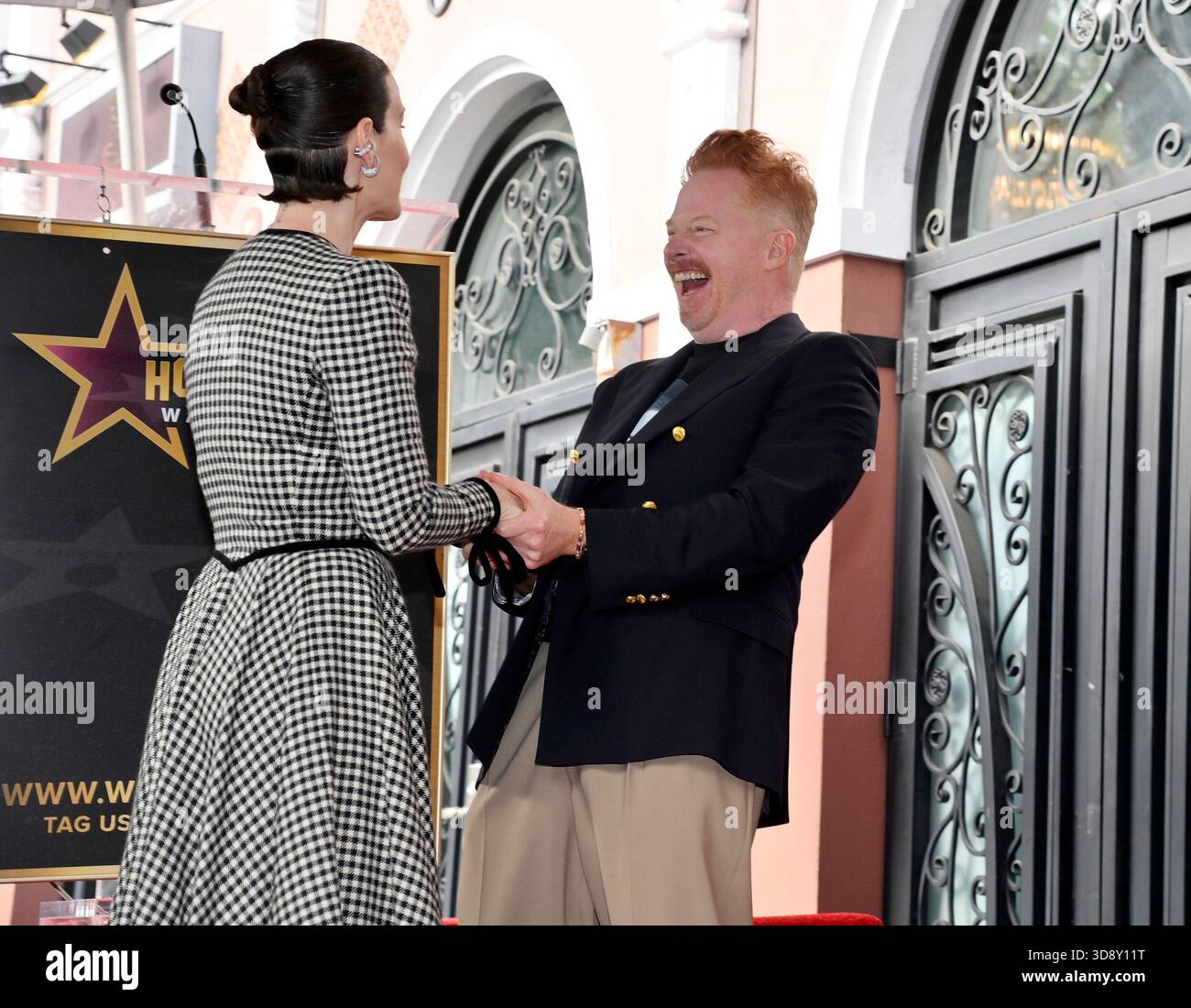 Actress Sarah Paulson (L) is joined by Jesse Tyler Ferguson during an ...