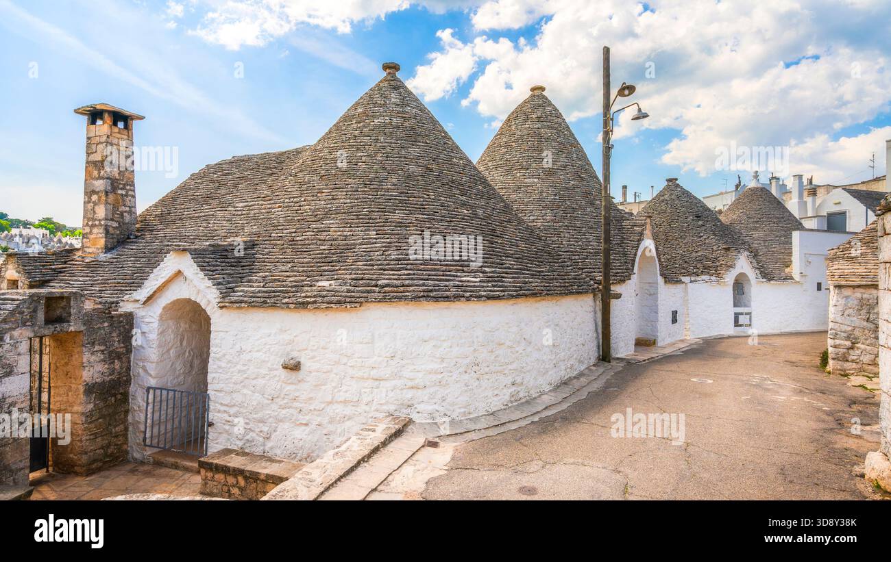 View iconic trulli houses in the historic district of Alberobello ...