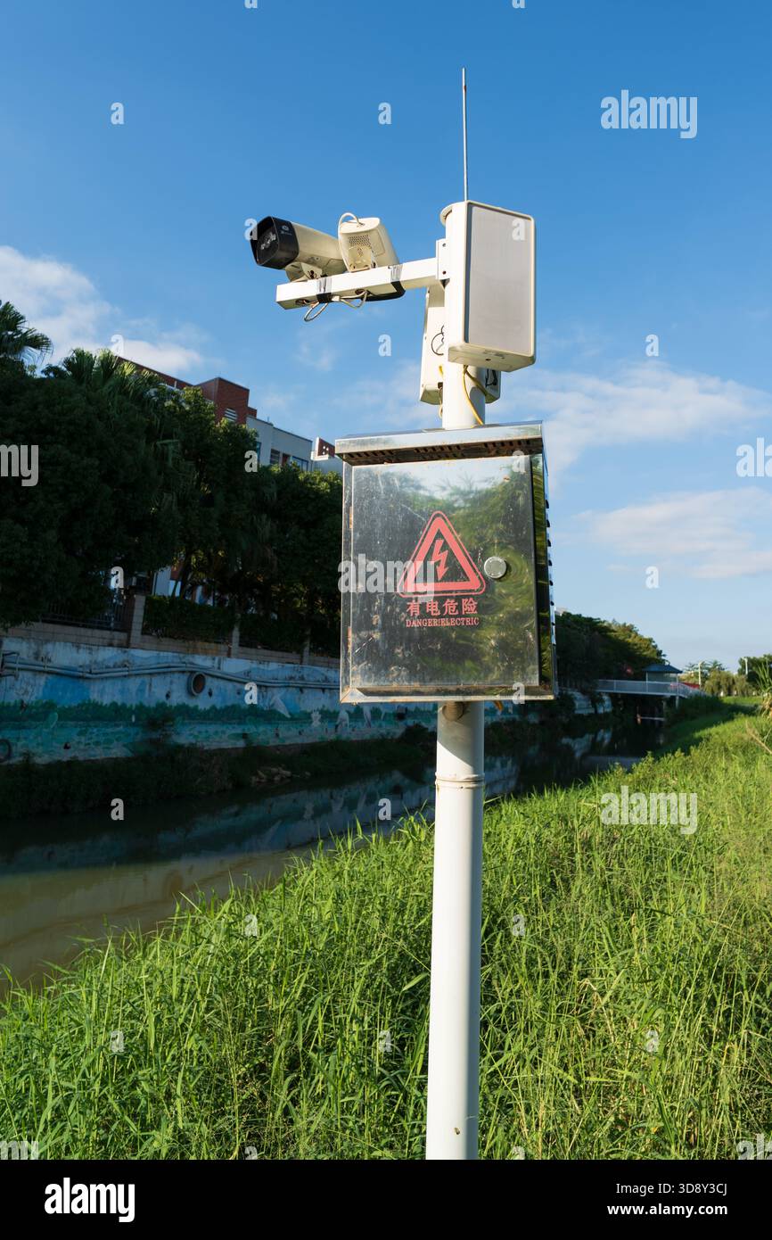 Numerous surveillance cameras are installed in a park in Dongguan City ...