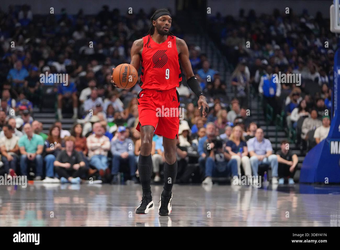Portland Trail Blazers forward Jerami Grant dribbles during the first half of an NBA basketball ...