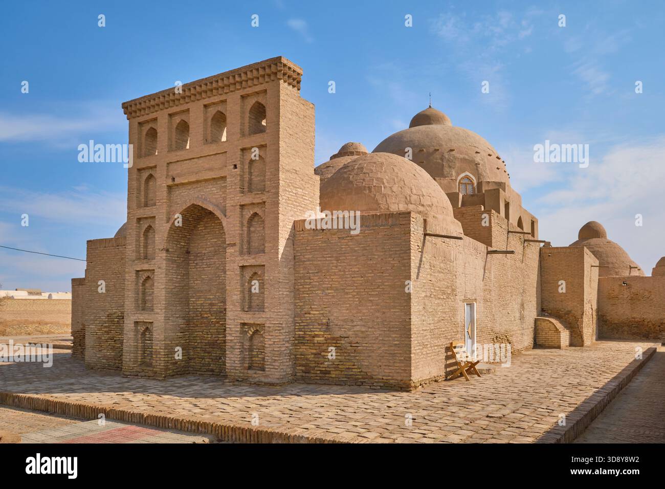 Exterior, simply finished in tan brick. At the Sheikh Mukhtar Vali ...