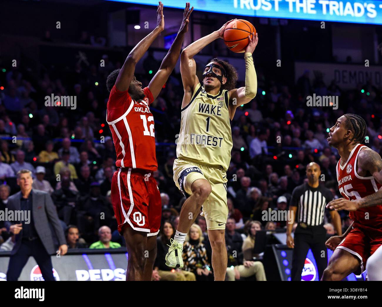 December 2, 2025: Wake Forest guard Nate Calmese (1) goes up for layup ...