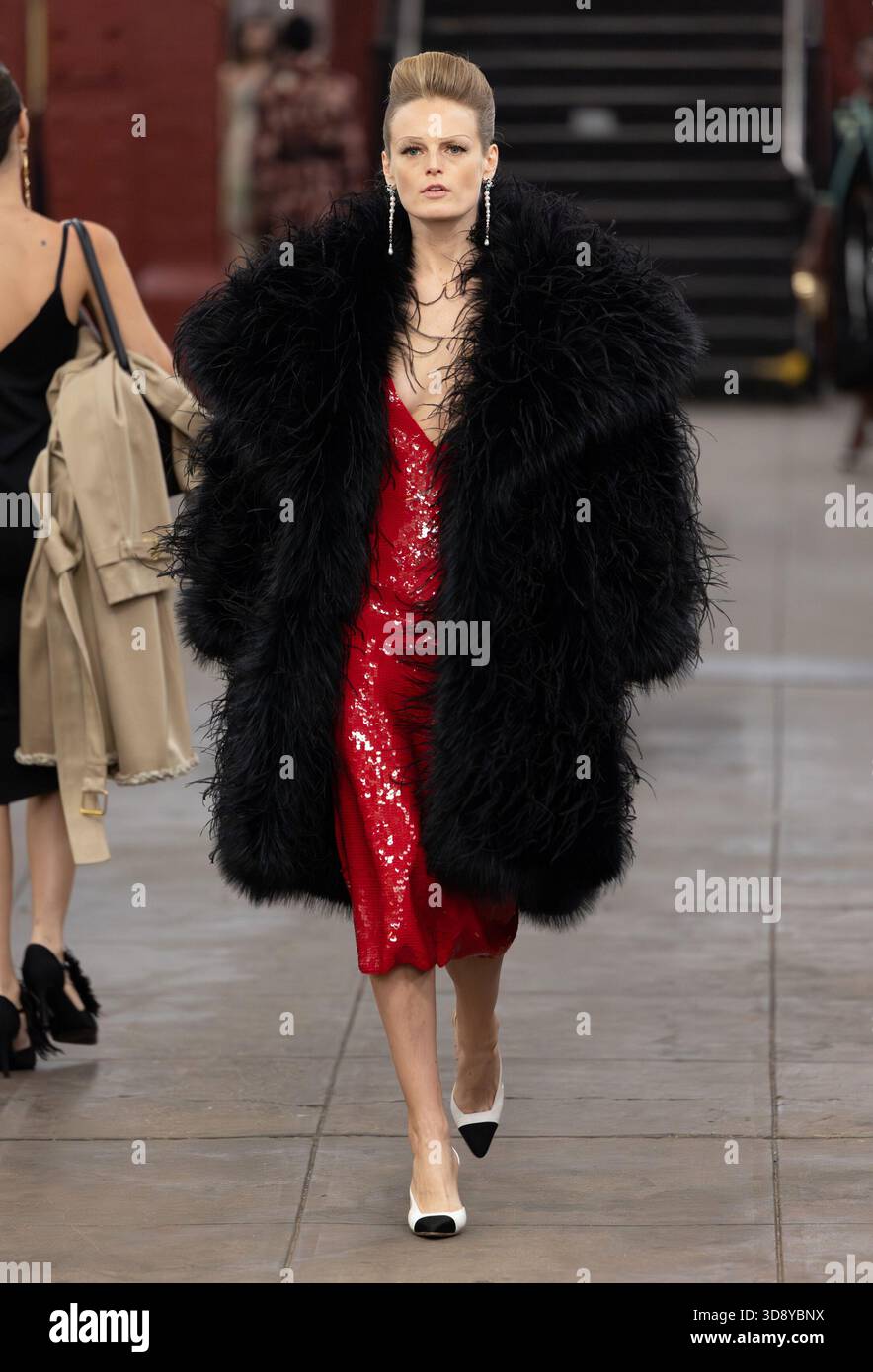 A model walks the runway during the CHANEL 2025/26 Métiers d'art ...