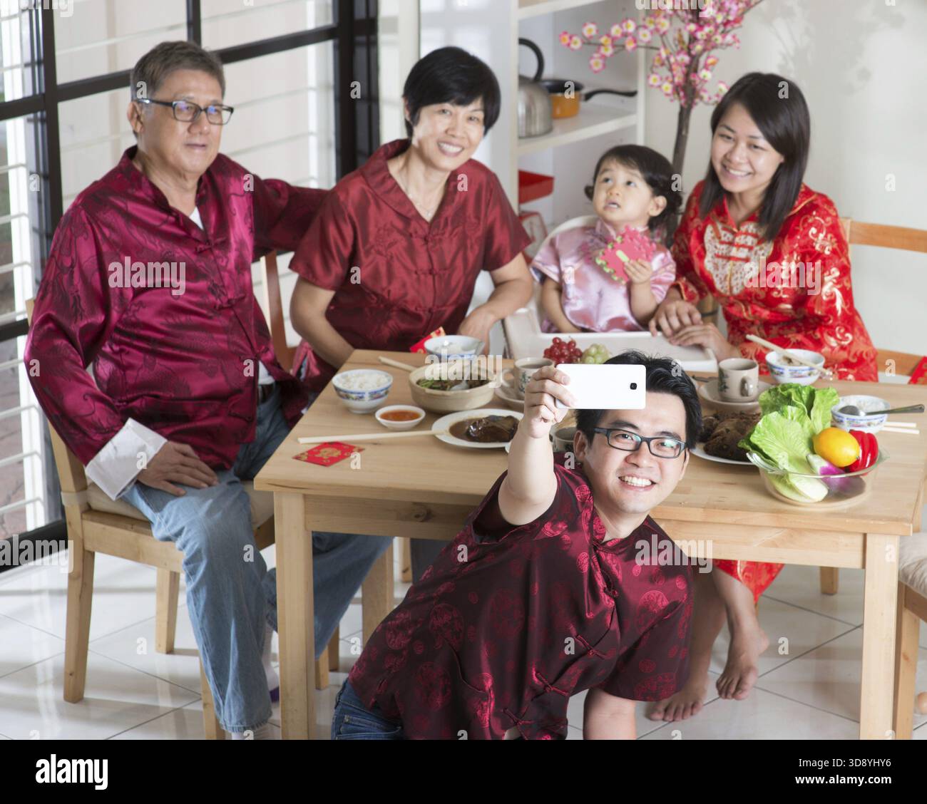 Chinese New Year, reunion dinner. Happy Asian Chinese multi generation ...