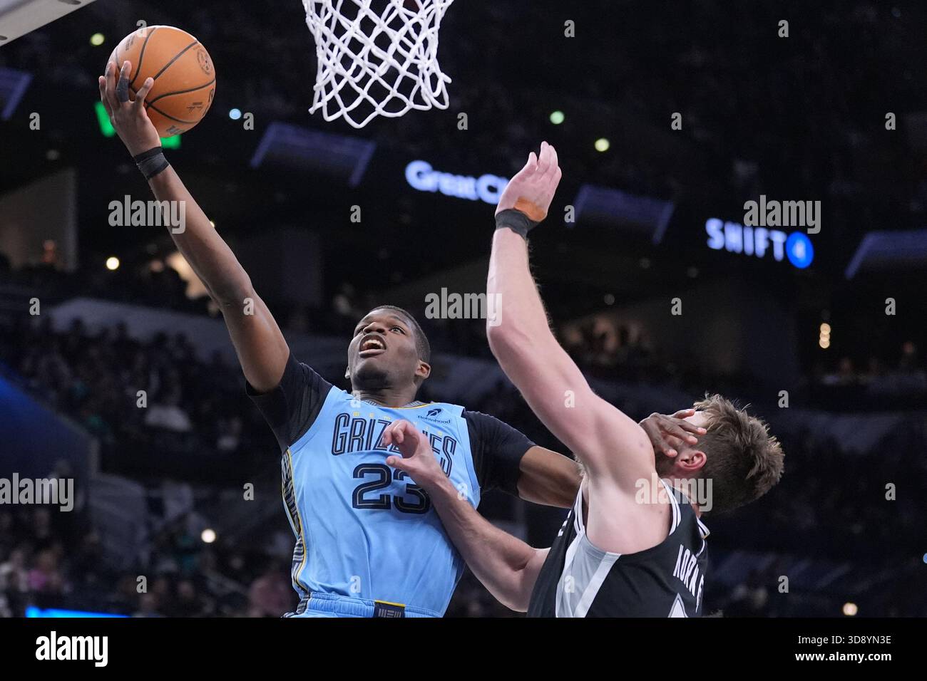 Memphis Grizzlies forward Cedric Coward (23) drives to the basket ...