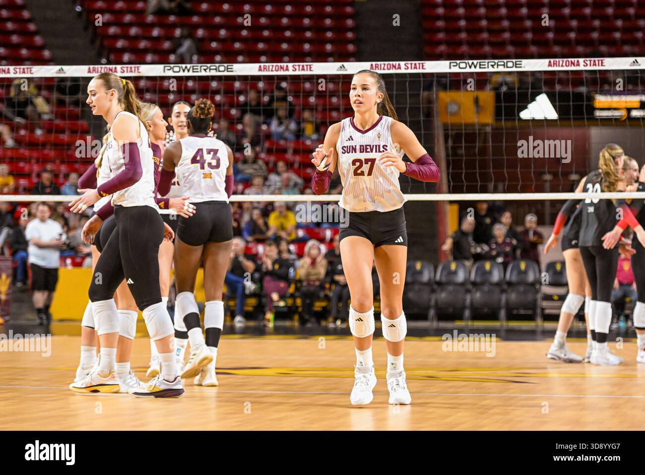 Arizona State Sun Devils setter Brynn Covell (27) jogs back to serve in ...