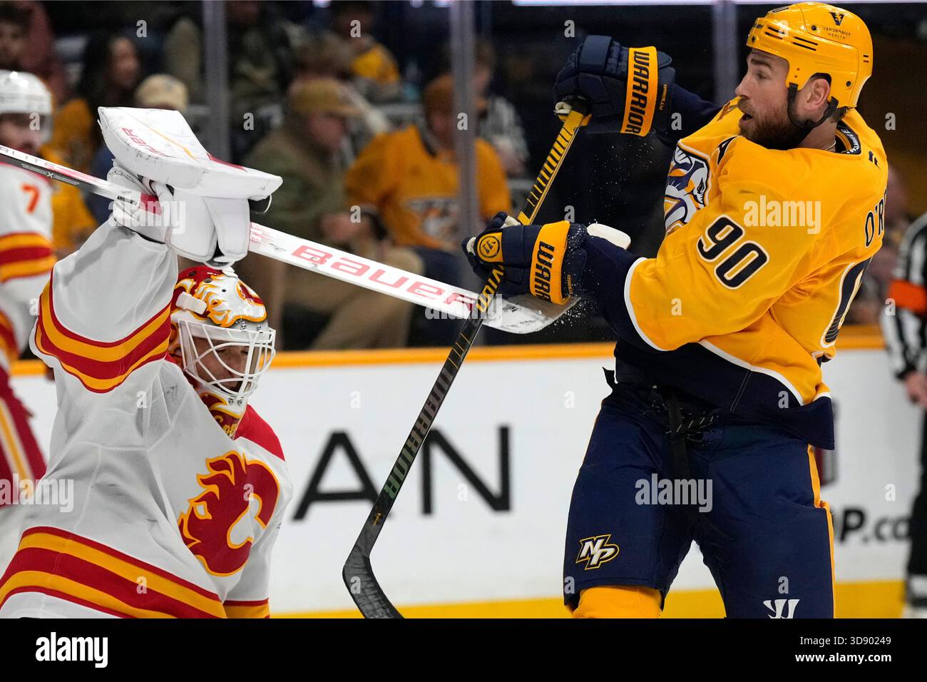 Calgary Flames goaltender Devin Cooley and Nashville Predators center ...