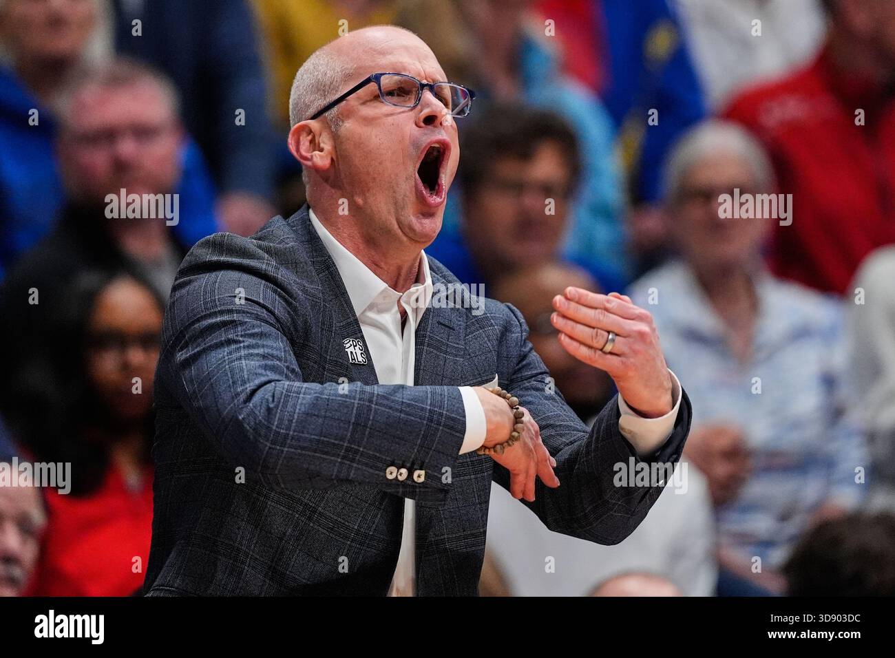 UConn head coach Dan Hurley motions to his players during the first ...