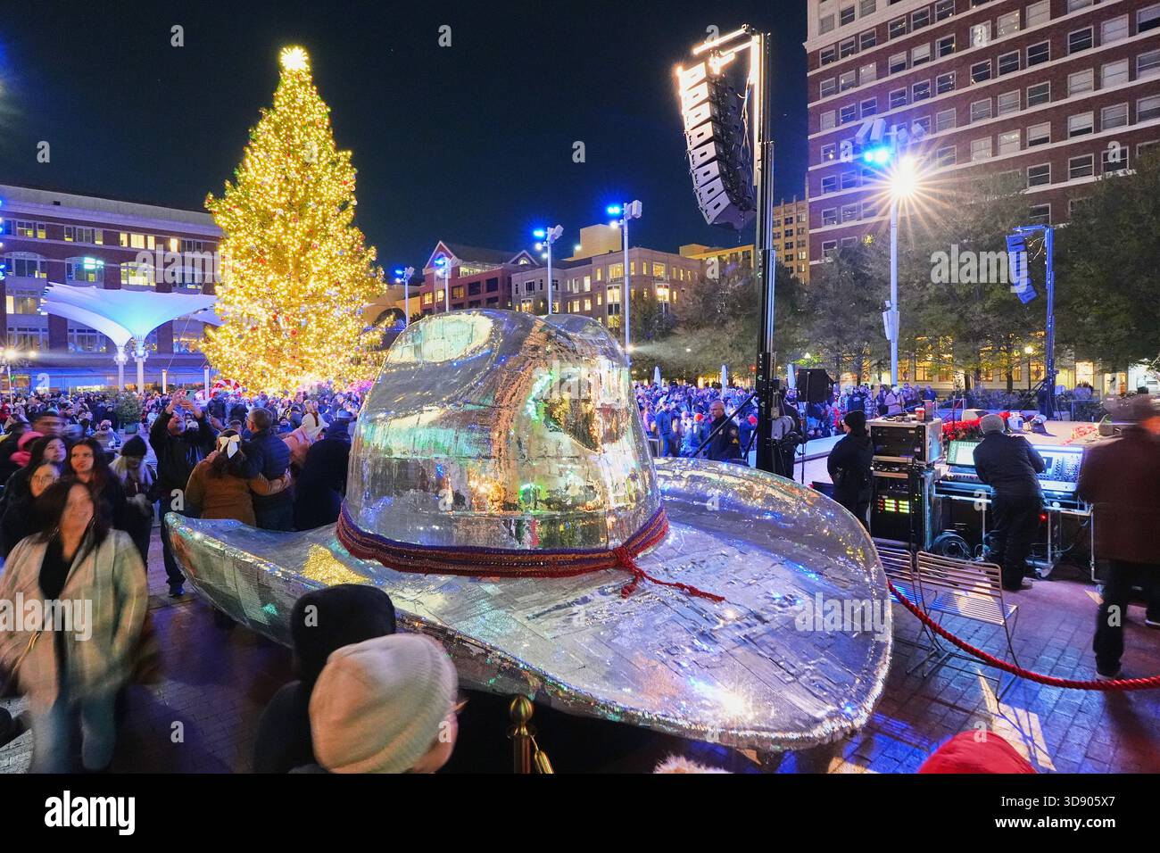 A large cowboy hat sits in the plaza at Sundance Square as visitors ...
