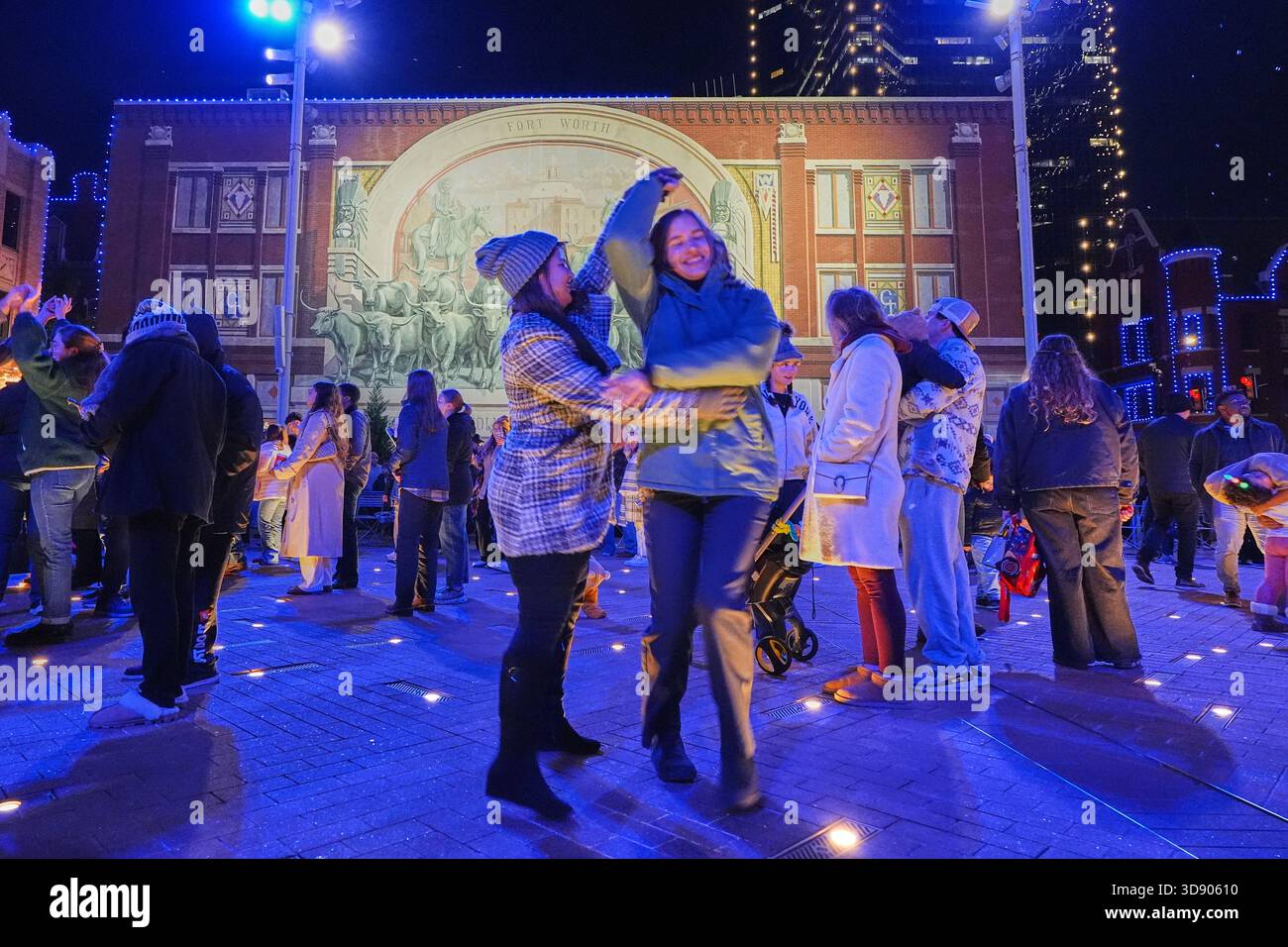 Natalie Williams, center left, and Angela Nach, center right, dance on ...