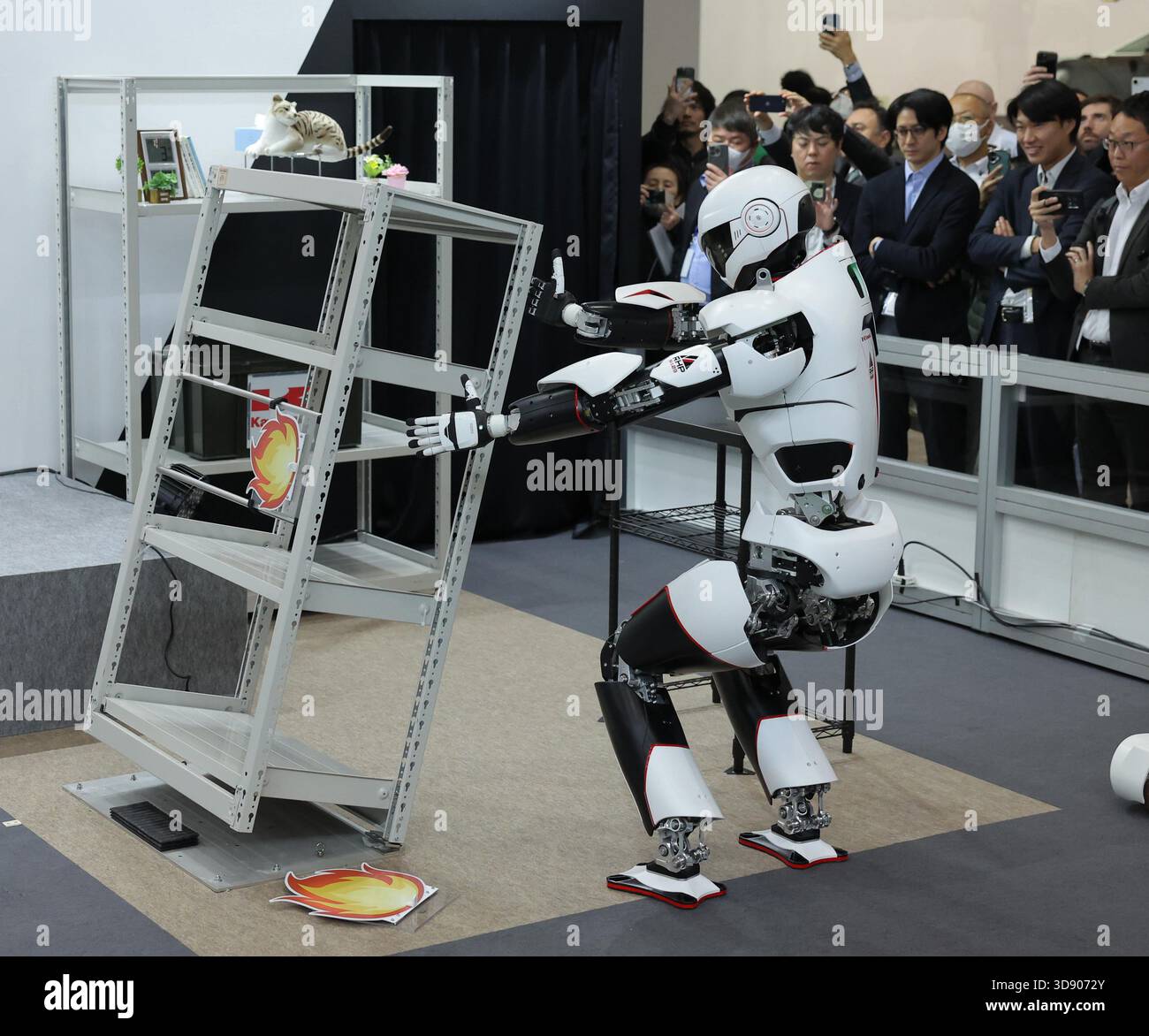 Kawasaki Heavy Industries demonstrates a humanoid robot, "Kaleido," at ...
