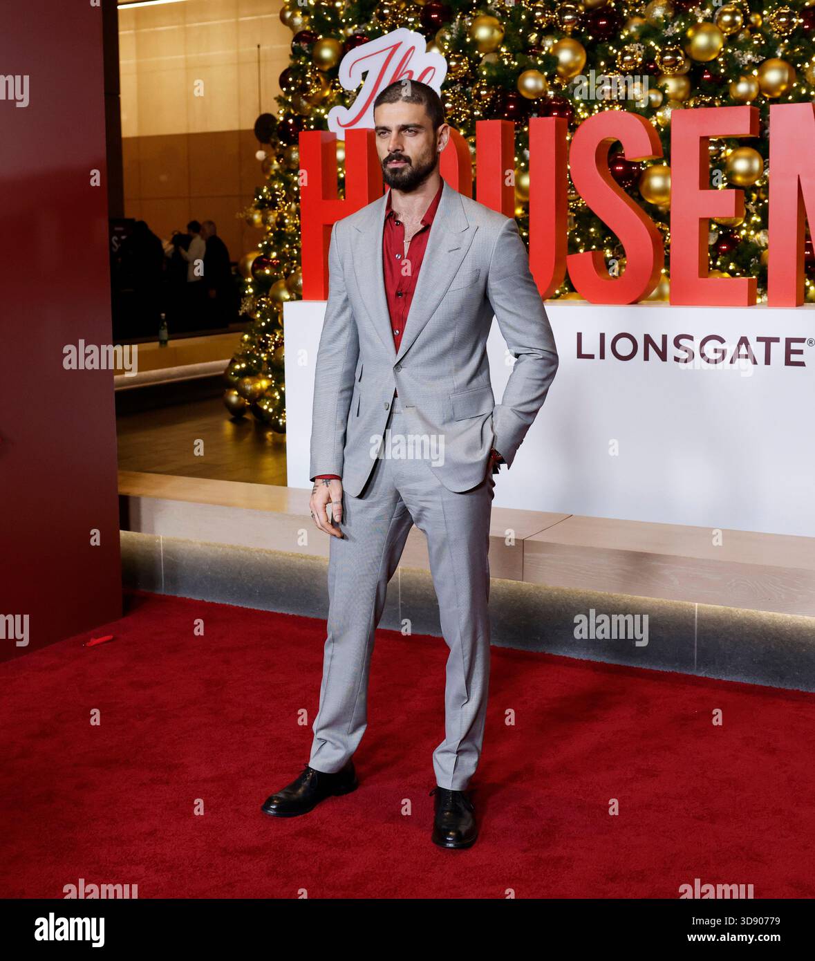 Michele Morrone arrives on the red carpet for Lionsgate "The Housemaid ...