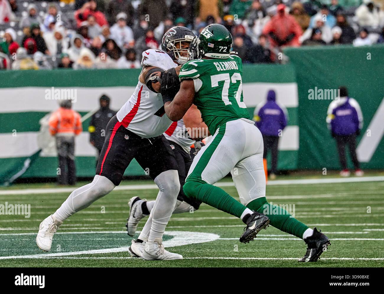 New York Jets defensive end Micheal Clemons (72) and Atlanta Falcons ...