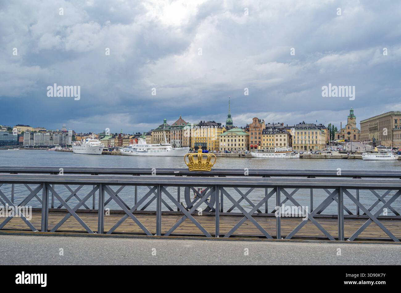 STOCKHOLM, SWEDEN - JULY 27, 2014: Gilded crown on Skeppsholmsbron (The ...