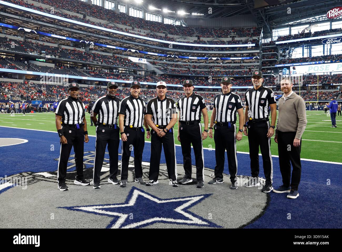 NFL officials, let to right, line judge Carl Johnson (101) field judge ...