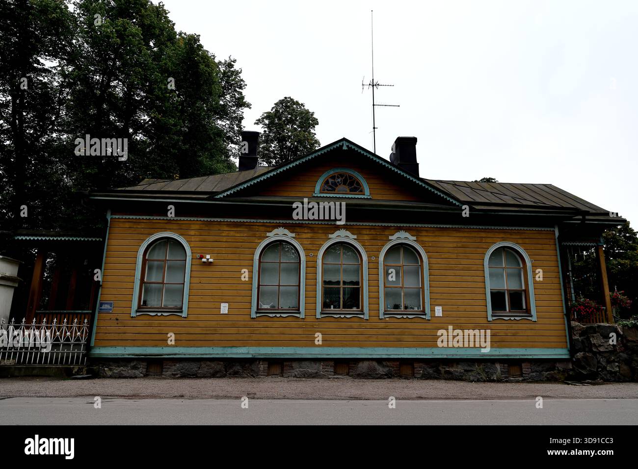 Symmetrical arched wooden windows hi-res stock photography and images ...