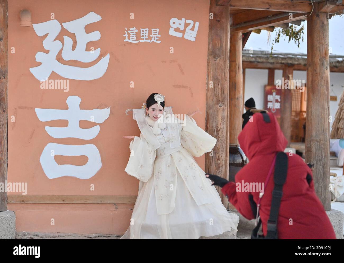 Yanji,China.2nd December 2025. Tourists dressed in traditional Korean ...
