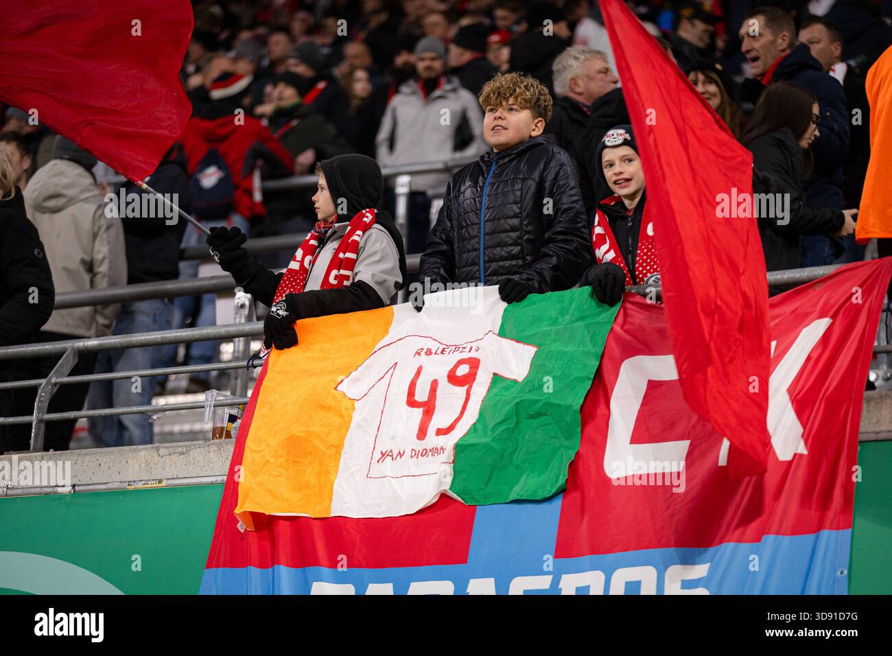 Leipzig, Germany. 02nd, December 2025. Young football fans of RB ...