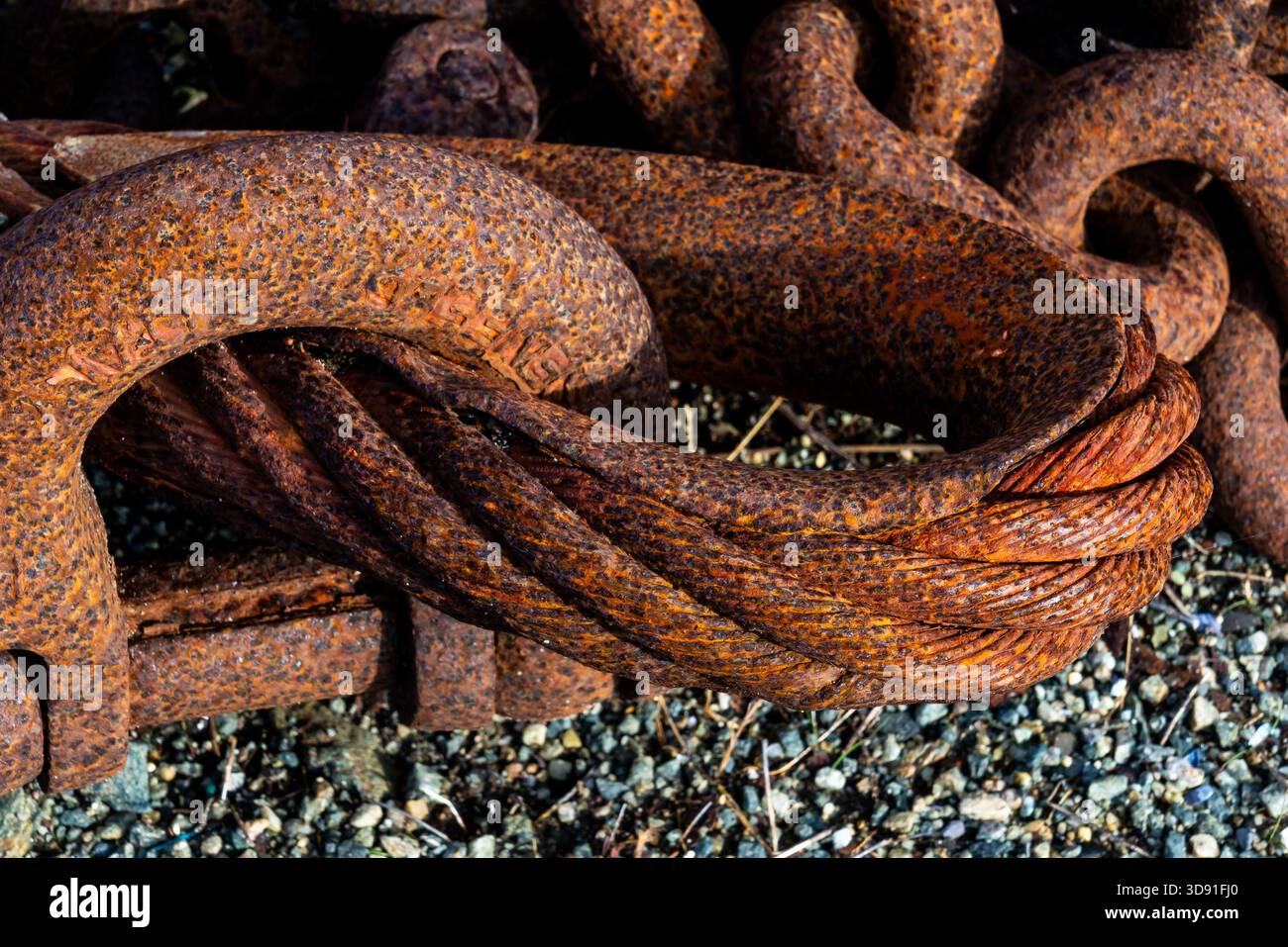 Close view of large rusted chain links showing coarse metal texture and ...