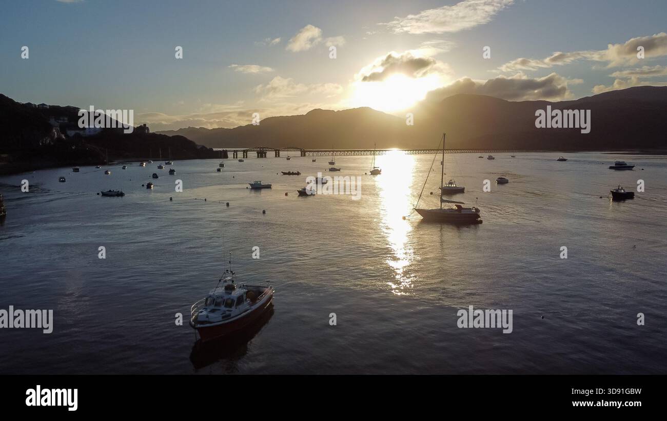 Aerial view of Barmouth at sunrise with the Mawddach Estuary and small ...