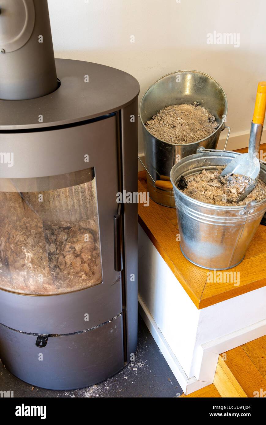 Maintenance cleaning fireplace after heating hi-res stock photography ...