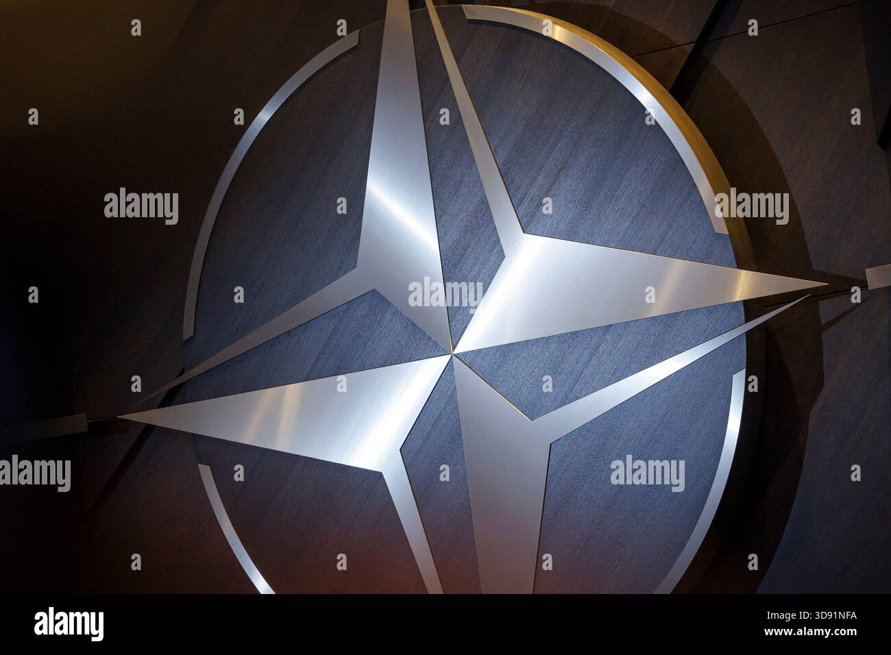 NATO logo in the meeting room. Brussels, December 3, 2025. Photographed ...