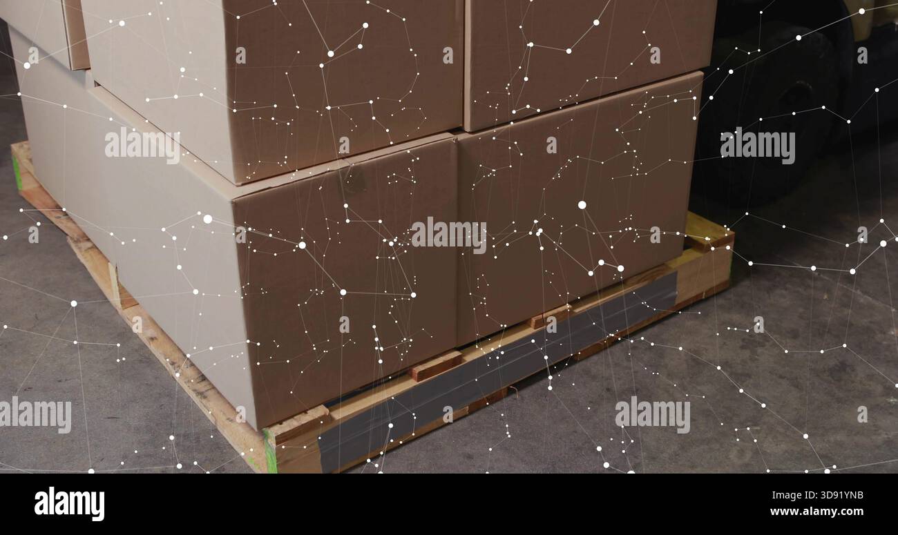 Showing stacked corrugated boxes sitting on pallet on warehouse floor ...