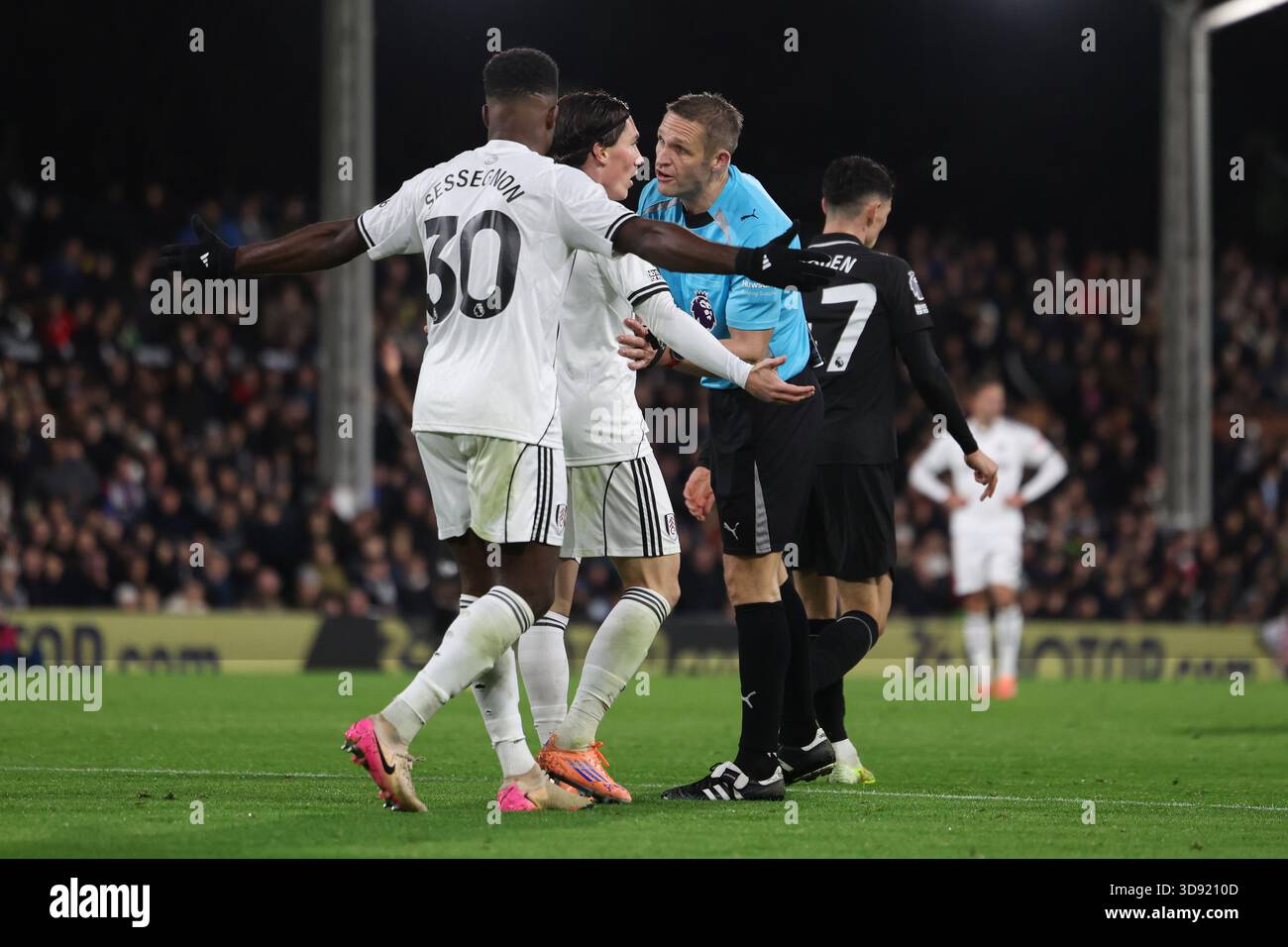 Fulham midfielder Harry Wilson (8) and Fulham defender Ryan Sessegnon (30) react to referee ...