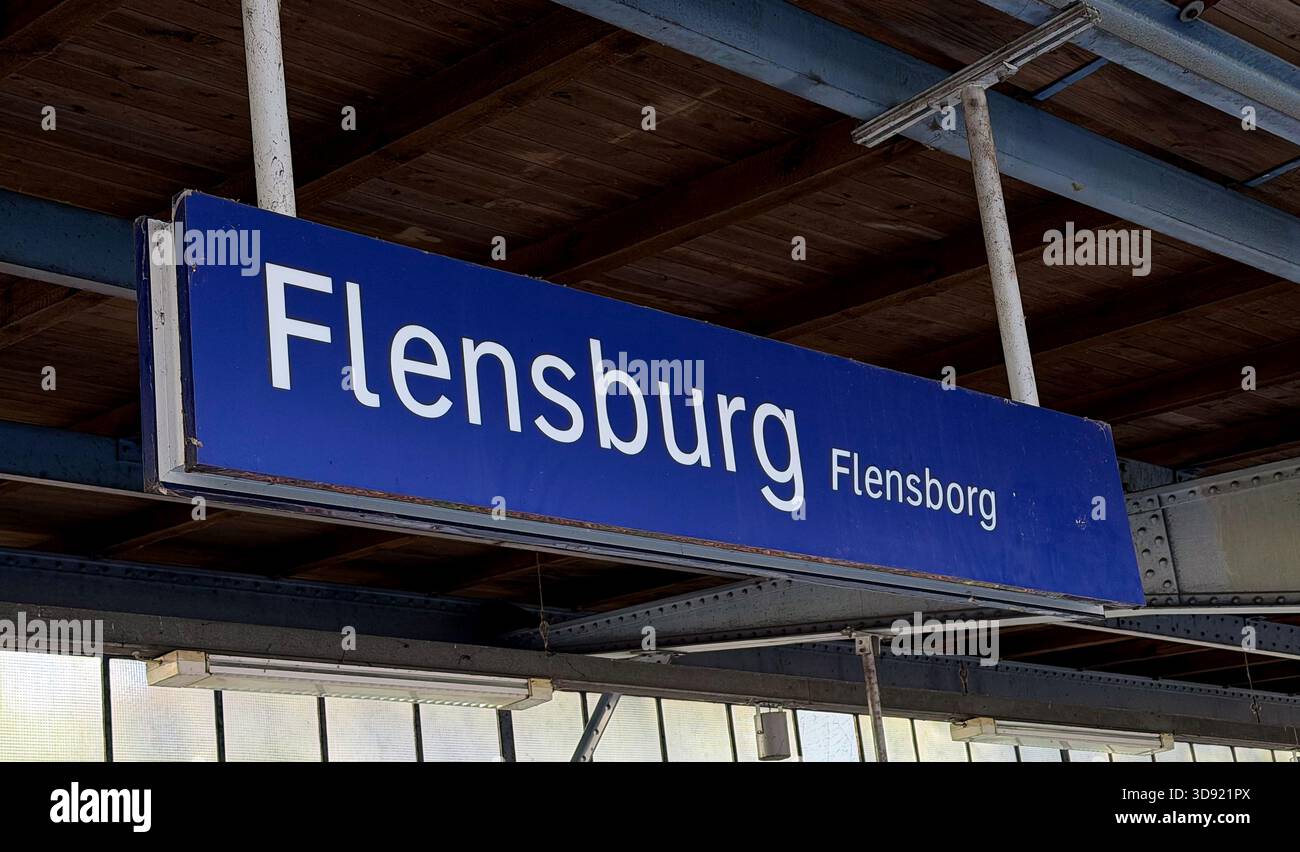 Blue train station sign hi-res stock photography and images - Alamy