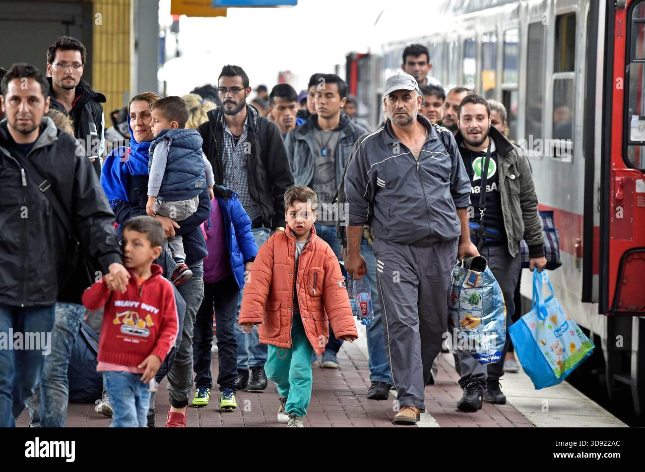 FILE - Refugees from Syria arrive at the train station in Dortmund ...