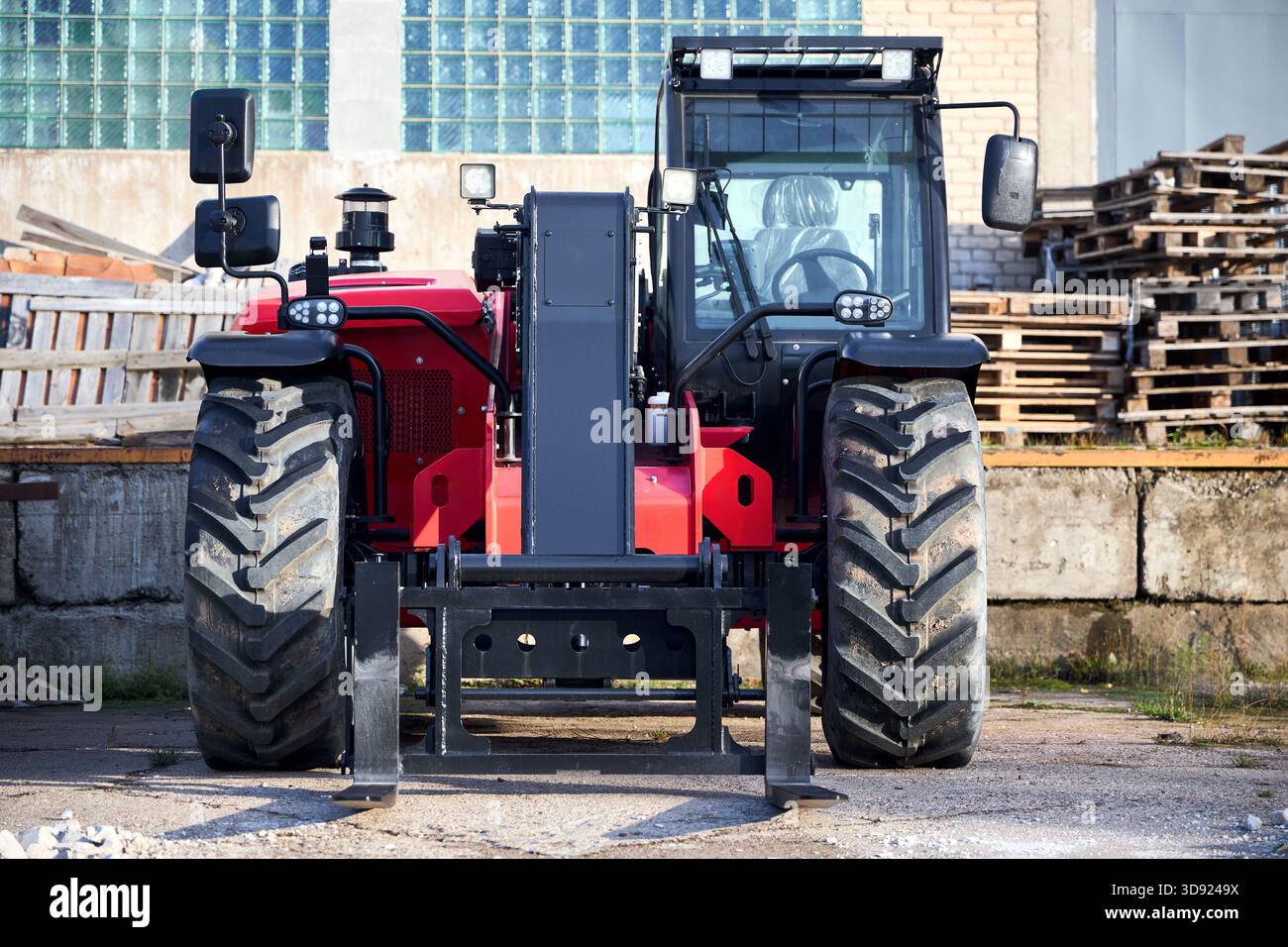 Black and red telehandler versatile agricultural and construction ...