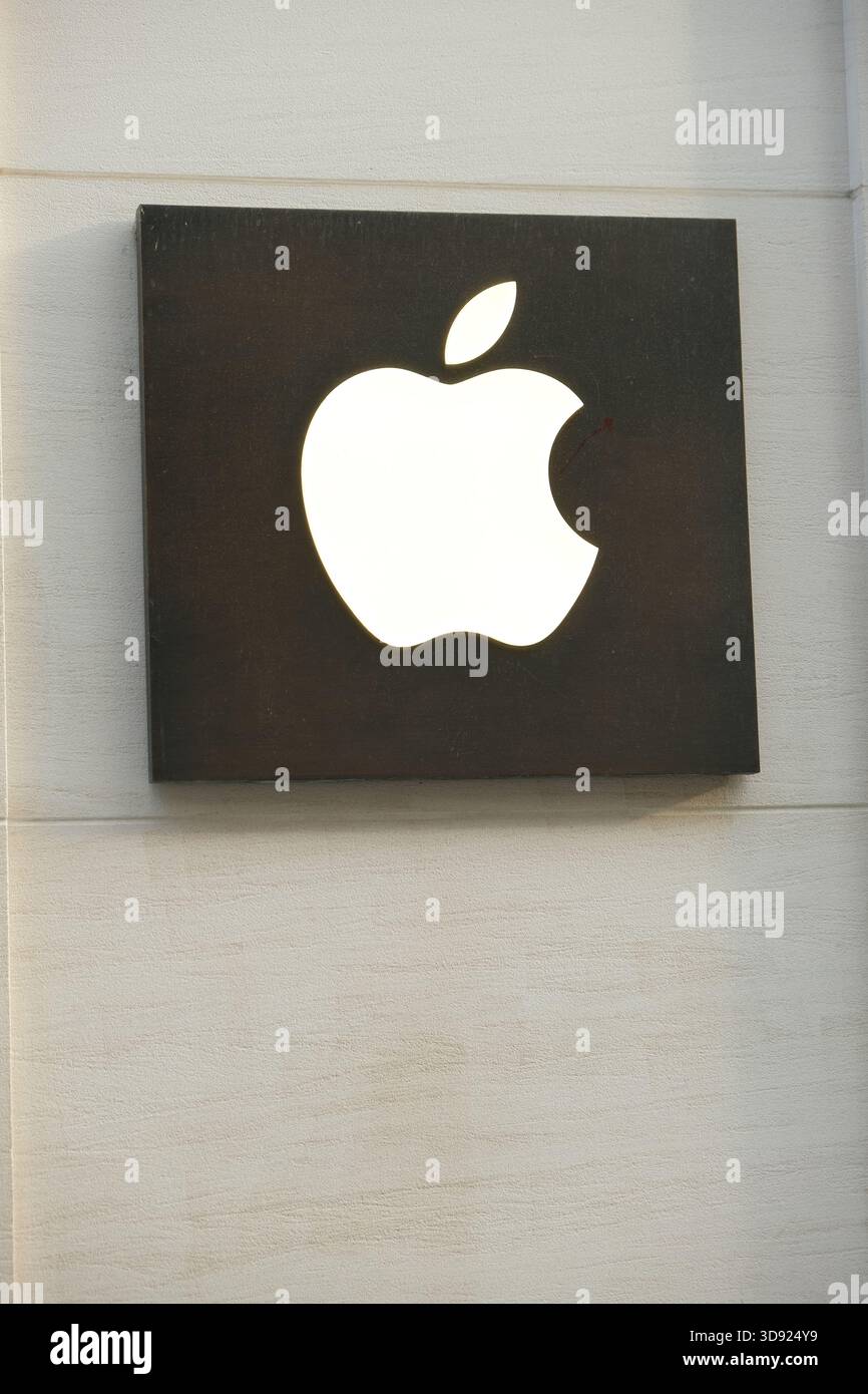 Close-up of the Illuminated Apple Store Logo on a Modern Building. 22 ...