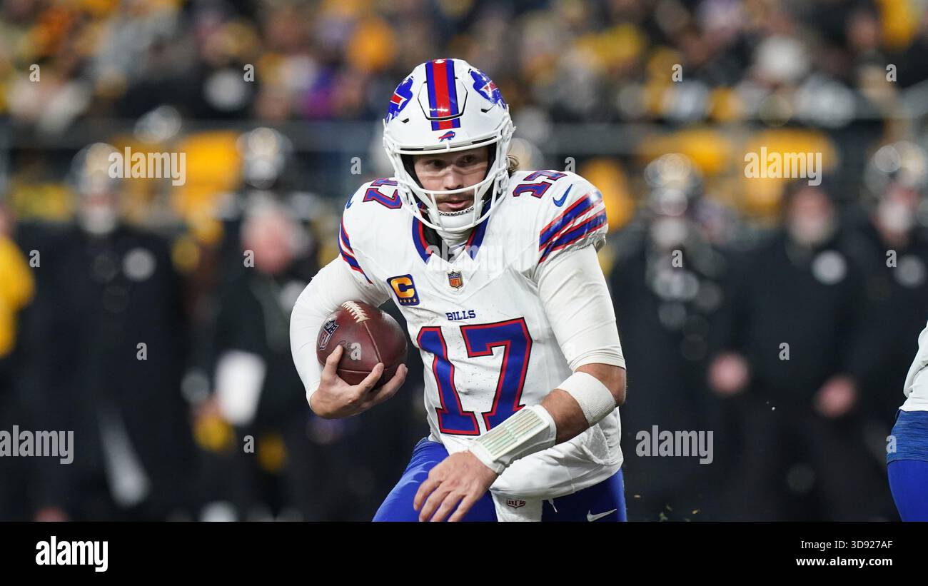 Buffalo Bills quarterback Josh Allen (17) carries for a touchdown ...