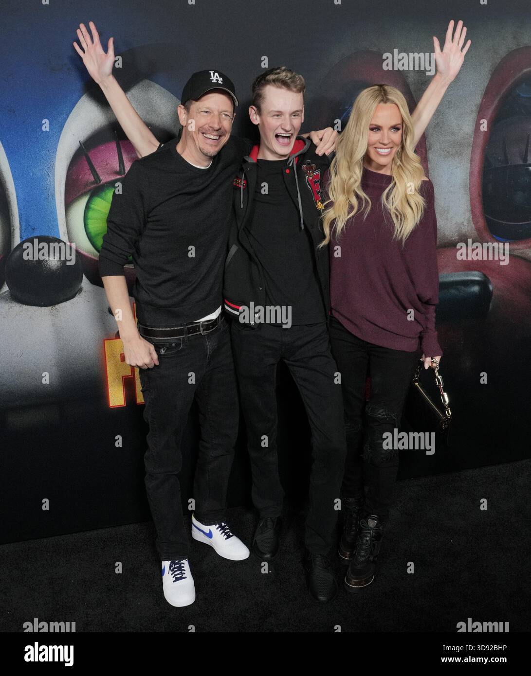 (L-R) John Asher, Evan Joseph Asher and Jenny McCarthy at the Universal ...