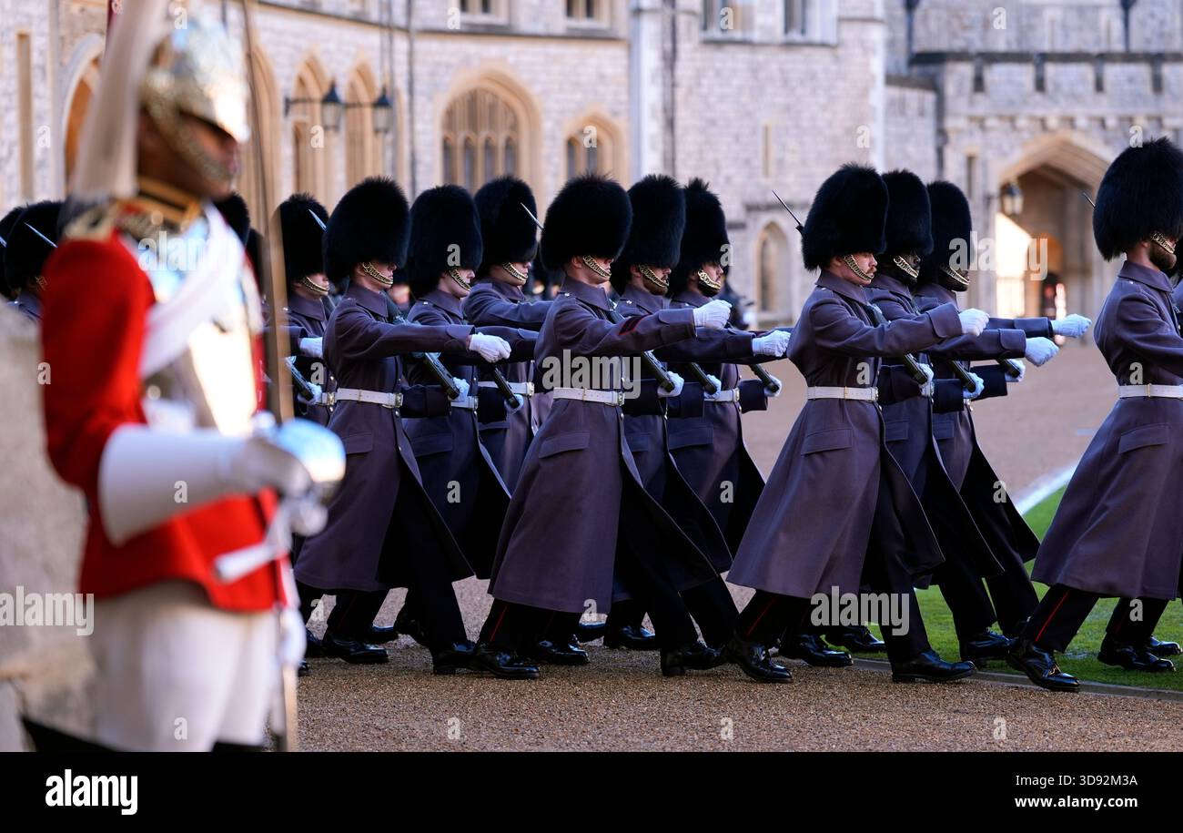 Grenadier guards march into the Quadrangle ahead of a ceremonial ...