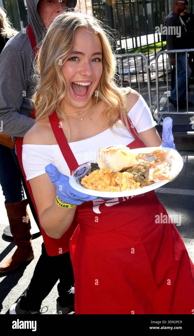 Actress Kylee Levien serves free lunch to the homeless at the LA ...
