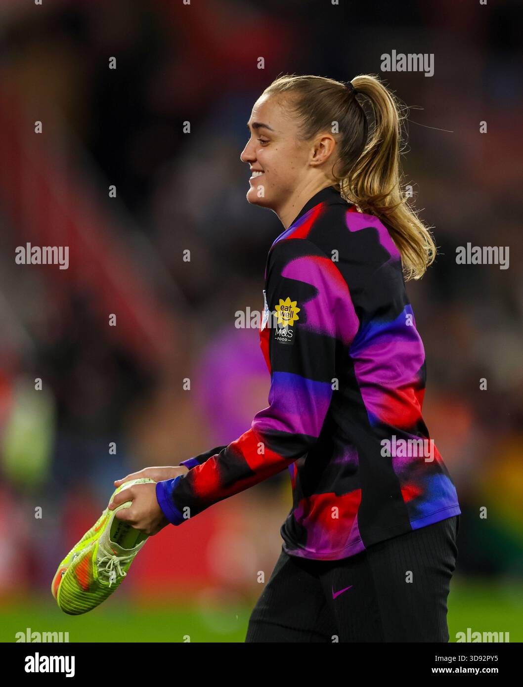England's Georgia Stanway giving her boots to fans following the women ...