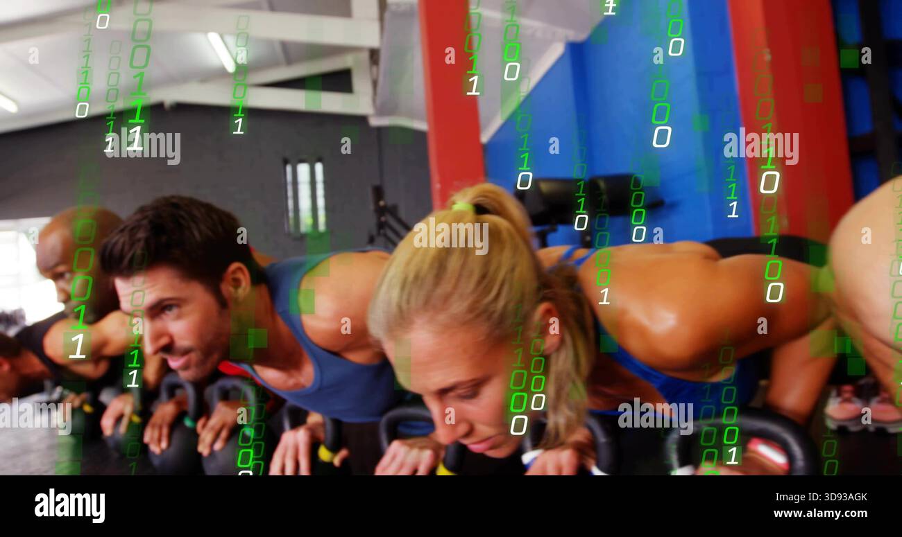 Performing kettlebell push-ups group in blue tanks on gym floor with ...