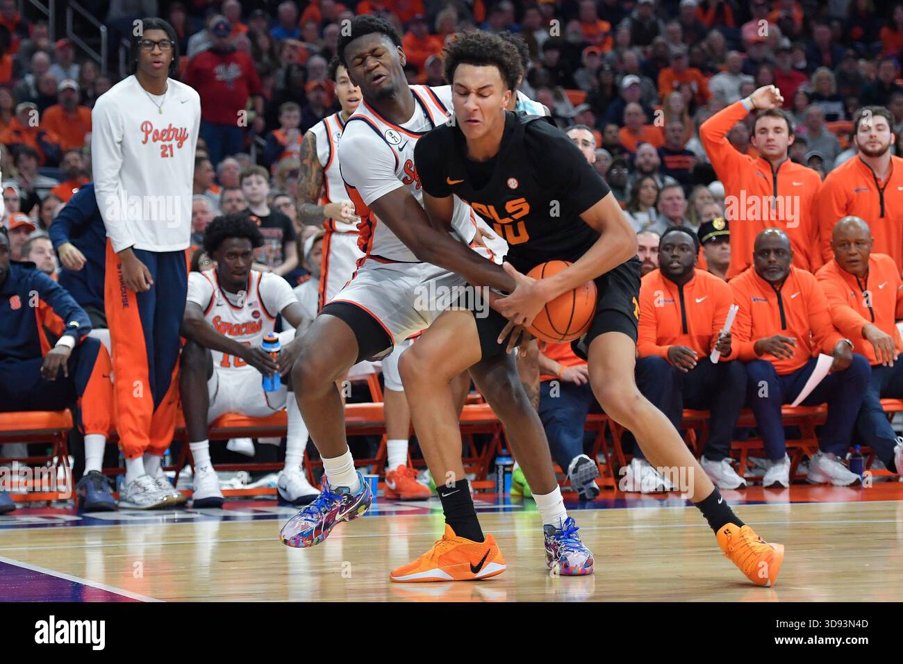 Tennessee forward Nate Ament, right, shields the ball from Syracuse ...